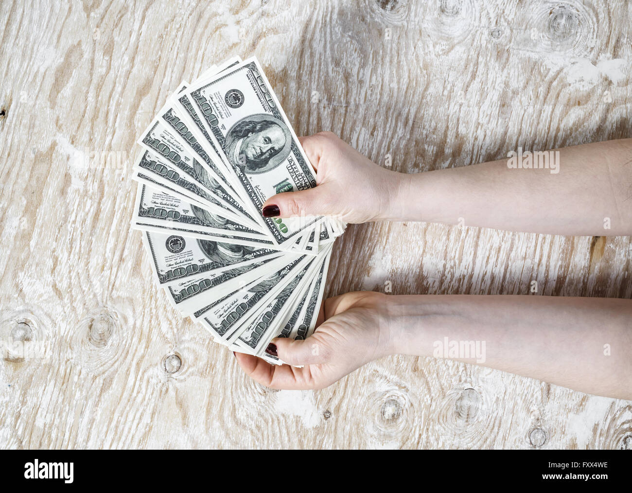Female hands dollar banknotes hi-res stock photography and images - Alamy