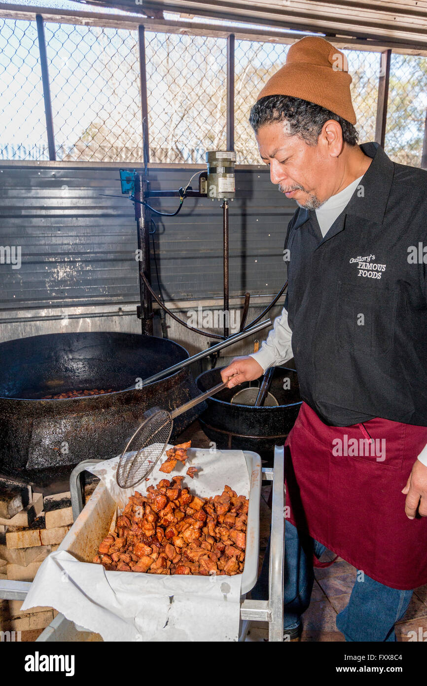 Darby Guillory cooks up a batch of his famous cracklins...deep fried ...