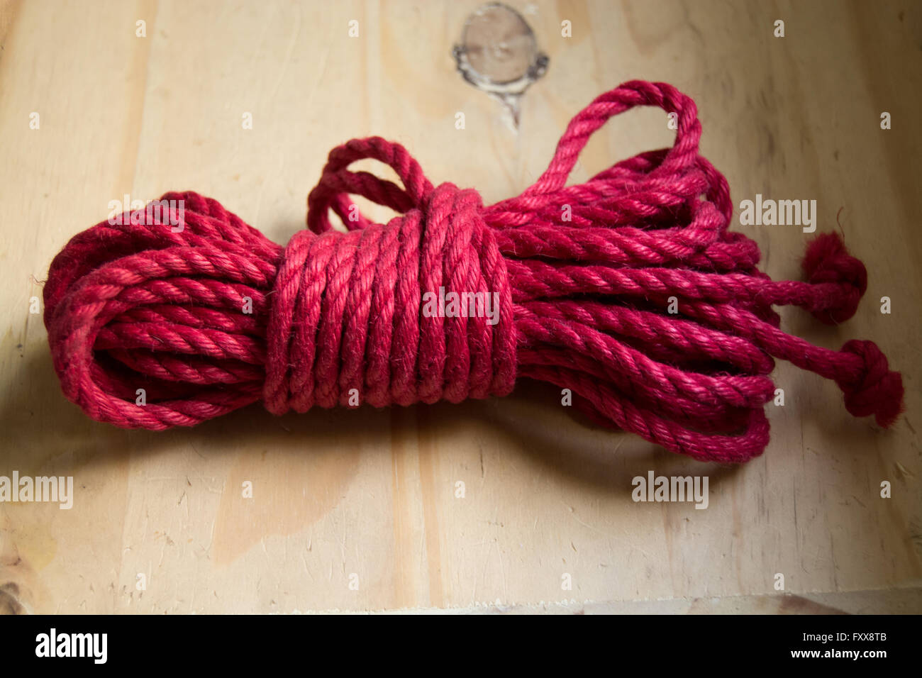 Red coiled rope Stock Photo - Alamy