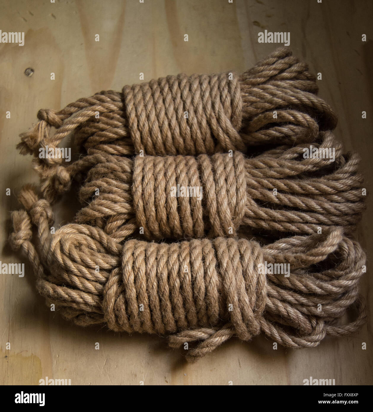 Three coiled ropes #2 Stock Photo - Alamy