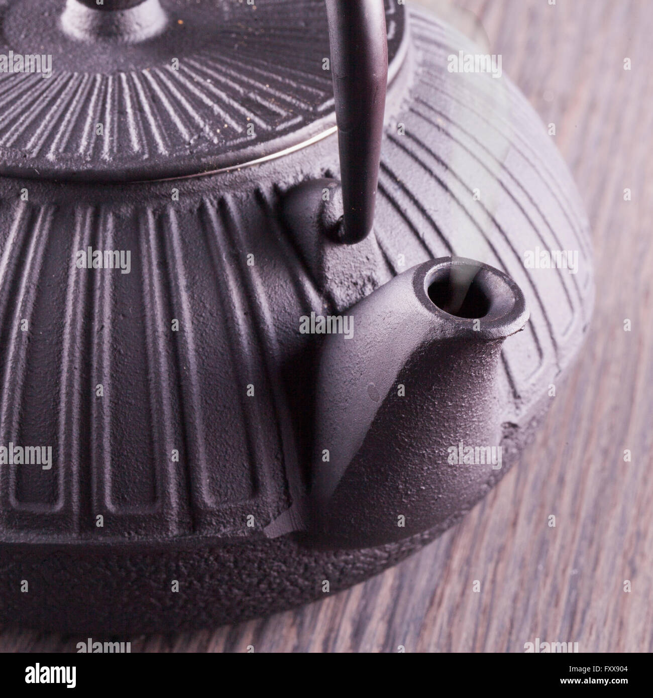 Teapot in close up, smoke coming out, square image Stock Photo - Alamy