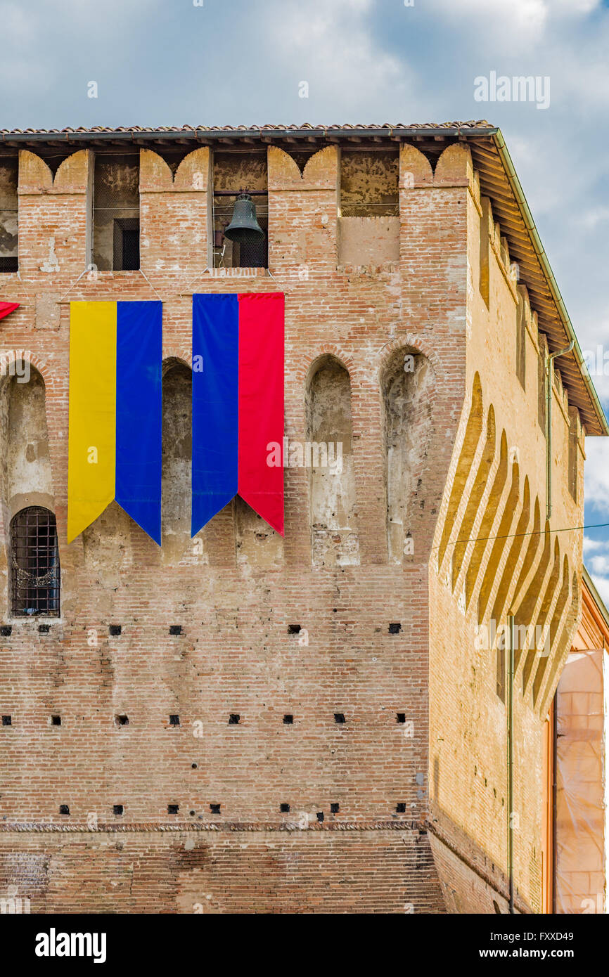 medieval castle with banners in Italy Stock Photo - Alamy