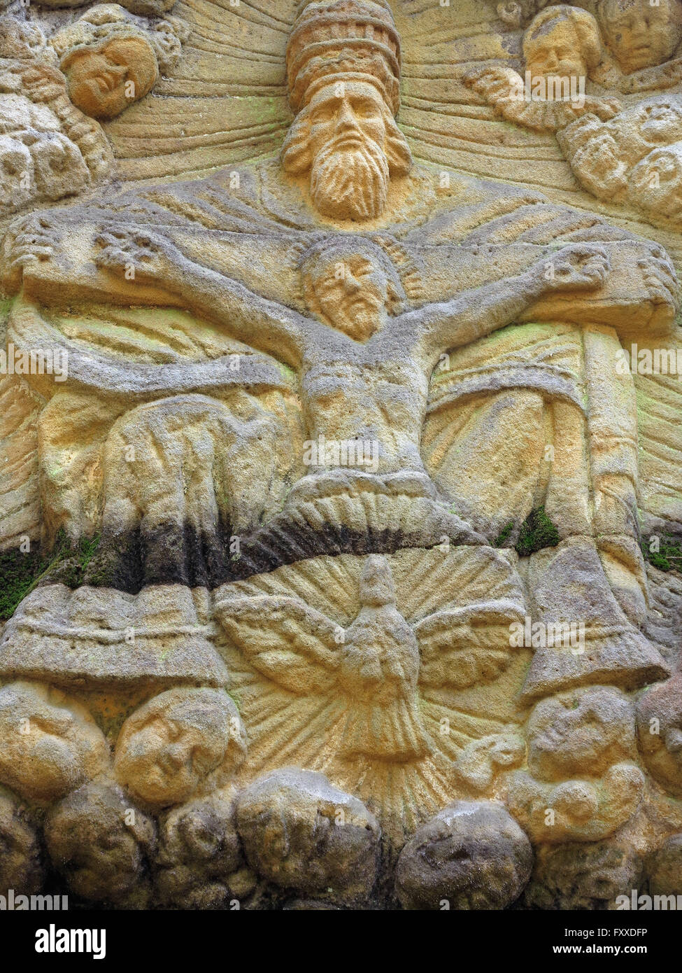 Relief of the Holy Trinity - stone altar carved in sandstone cliff in ...