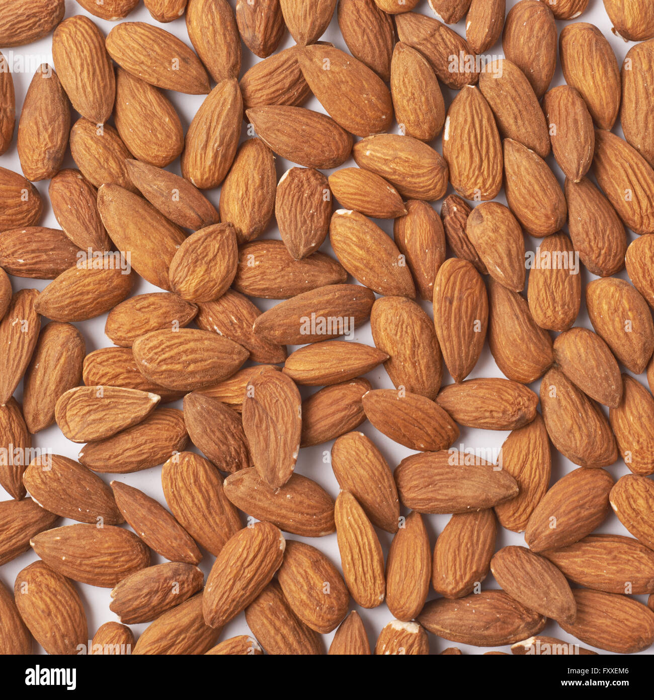 Surface covered with multiple almonds Stock Photo - Alamy