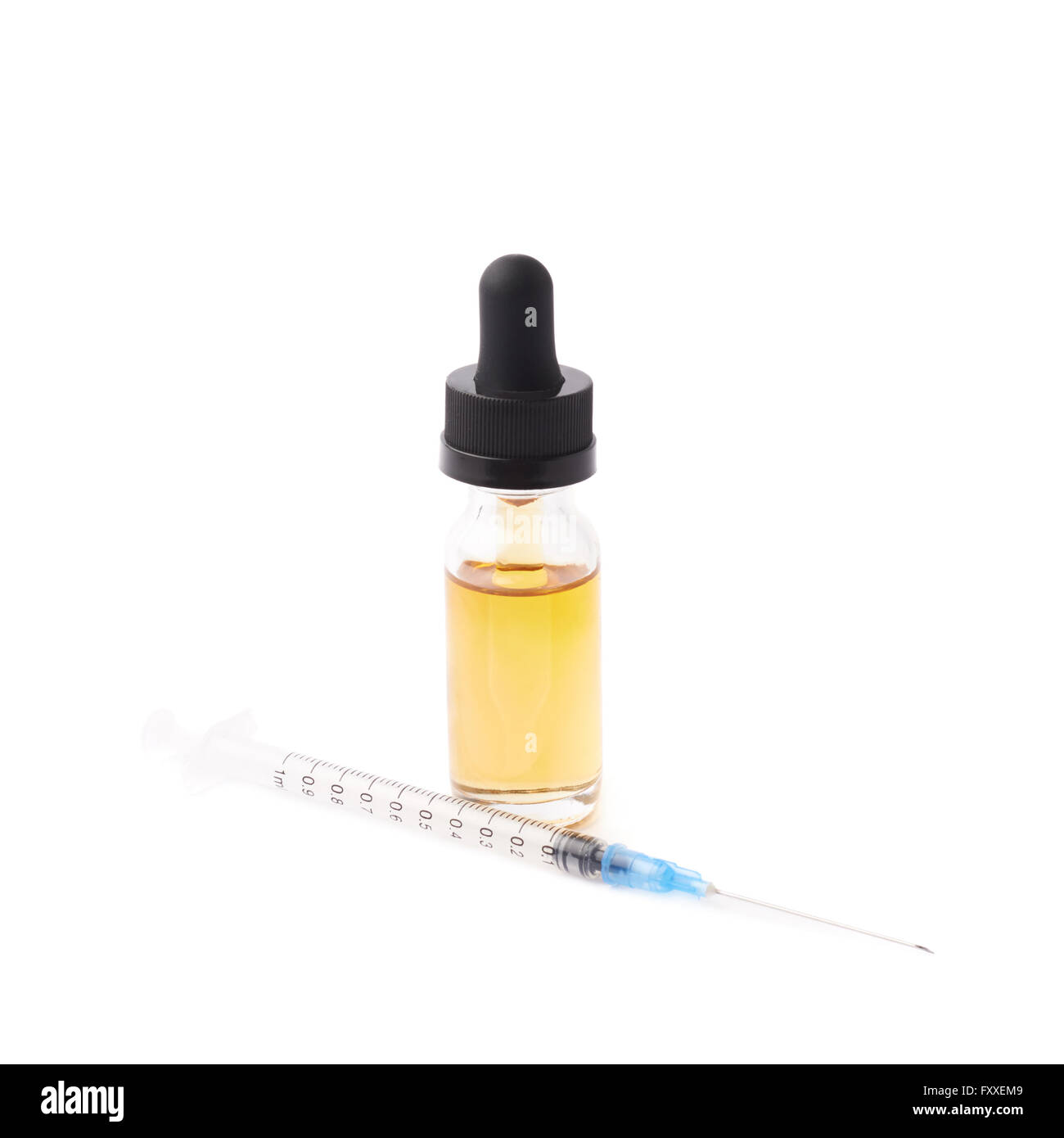 Small bottle with a pipette and syringe Stock Photo - Alamy