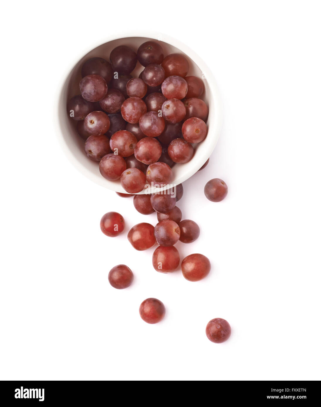 Dark red grapes spilled out of bowl Stock Photo - Alamy