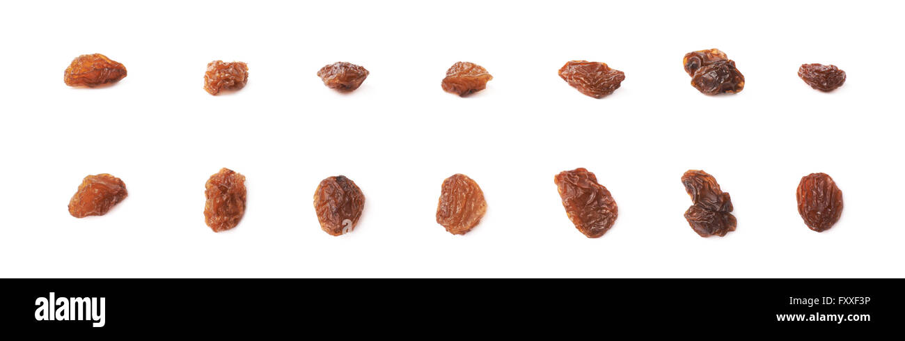Multiple single raisins isolated Stock Photo - Alamy