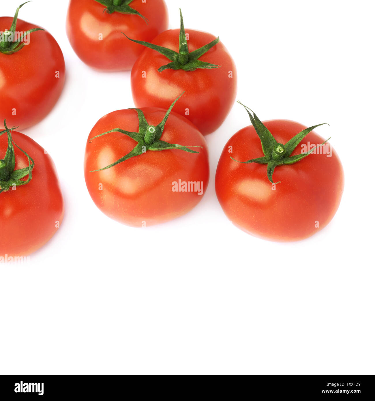 Pile of multiple tomatoes isolated Stock Photo - Alamy