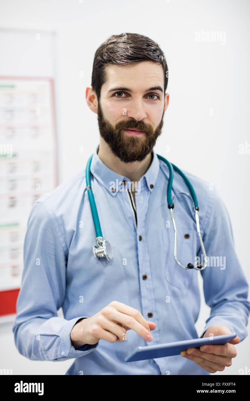Doctor using tablet internet browsing hi-res stock photography and ...