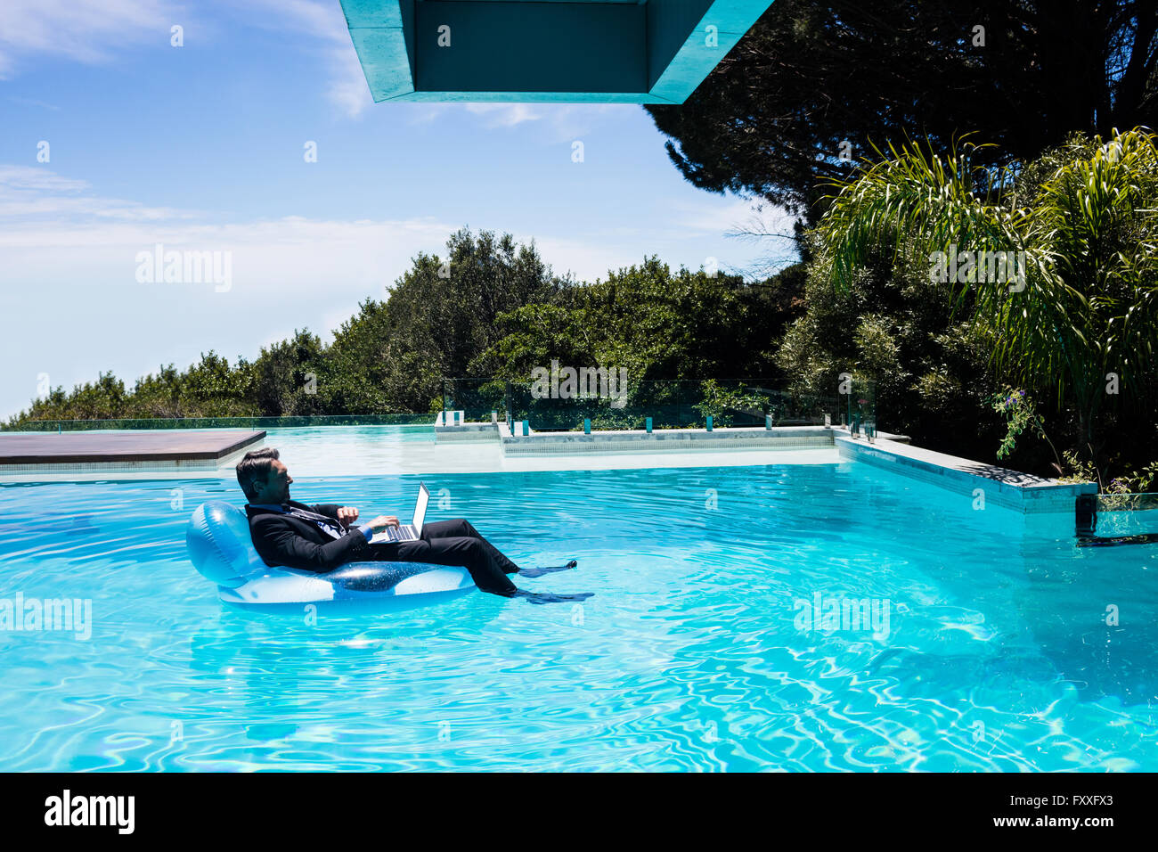 Business man swimming pool inflatable hi-res stock photography and ...