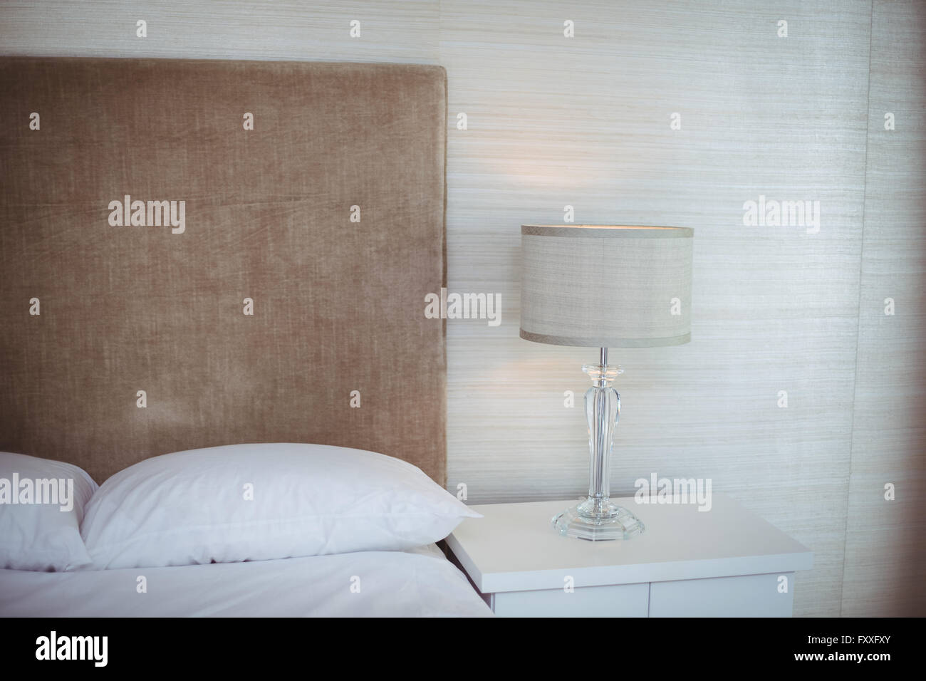 Illuminated lamp shade in bedroom Stock Photo - Alamy