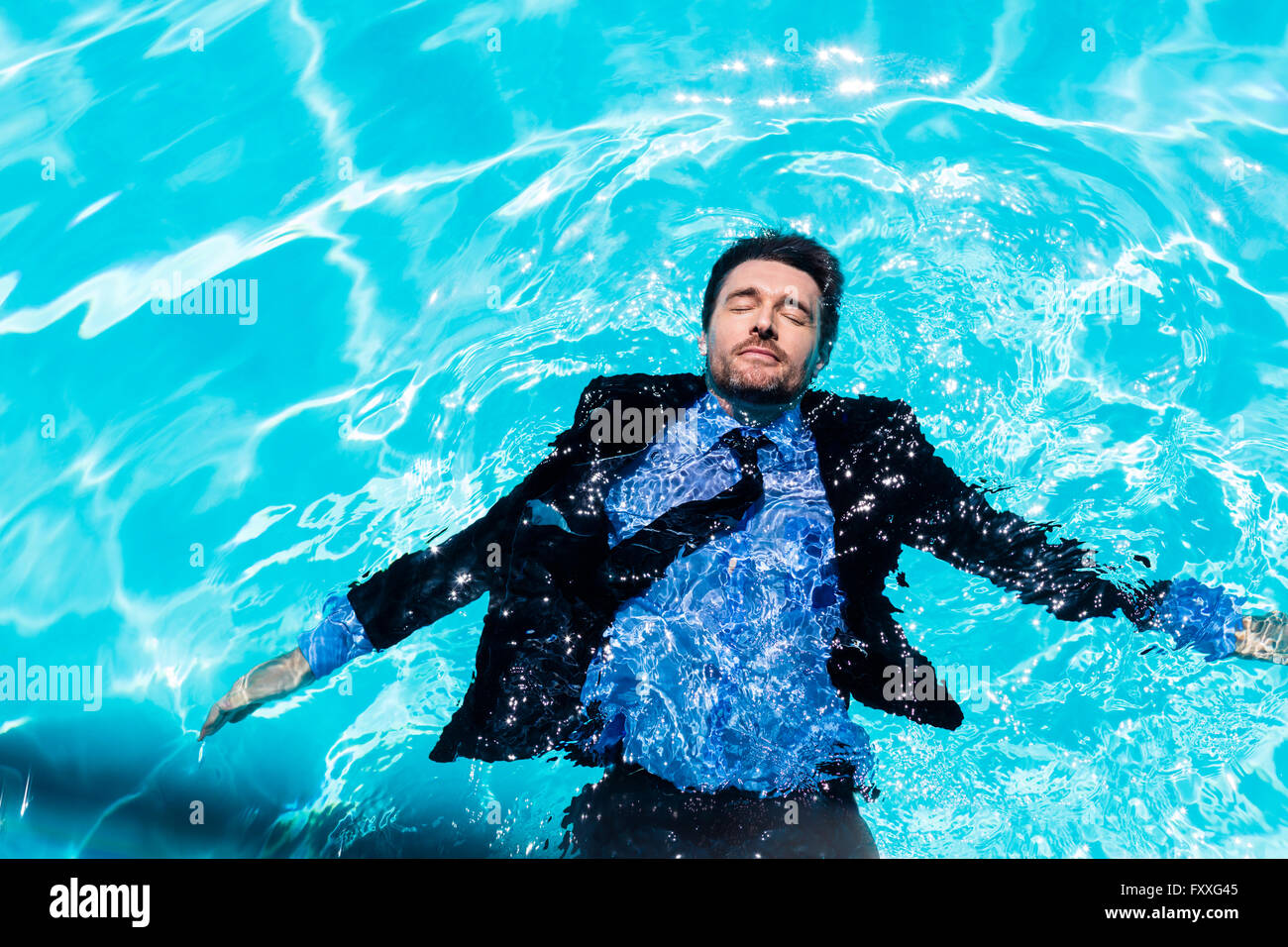 Businessman swimming pool hi-res stock photography and images - Alamy