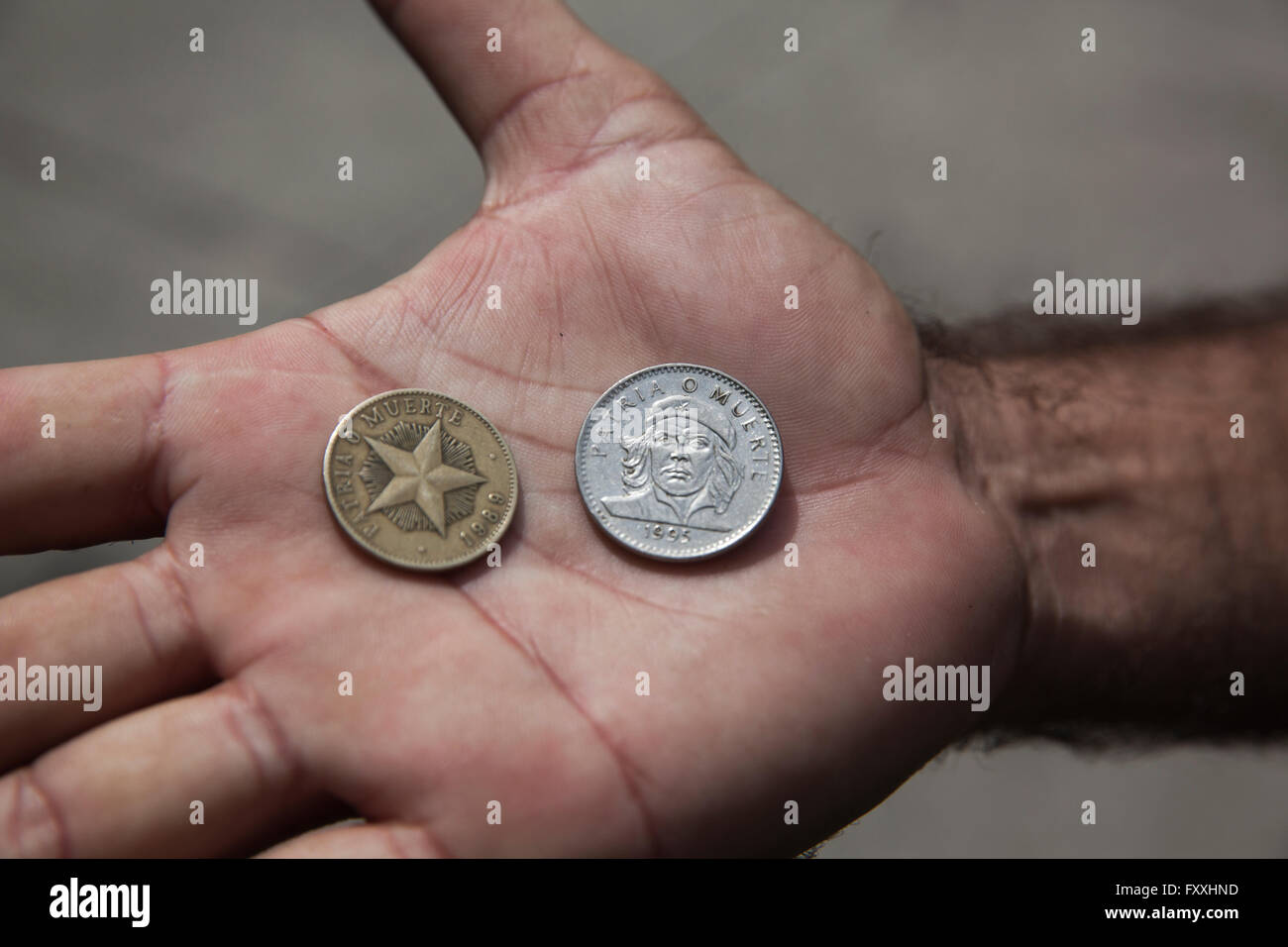 Old Cuban coins featuring the iconic face on 'Che Guevara' and the star ...