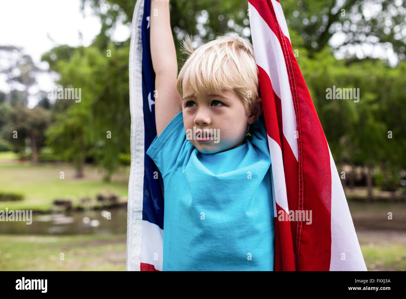 Child holding flag hi-res stock photography and images - Alamy
