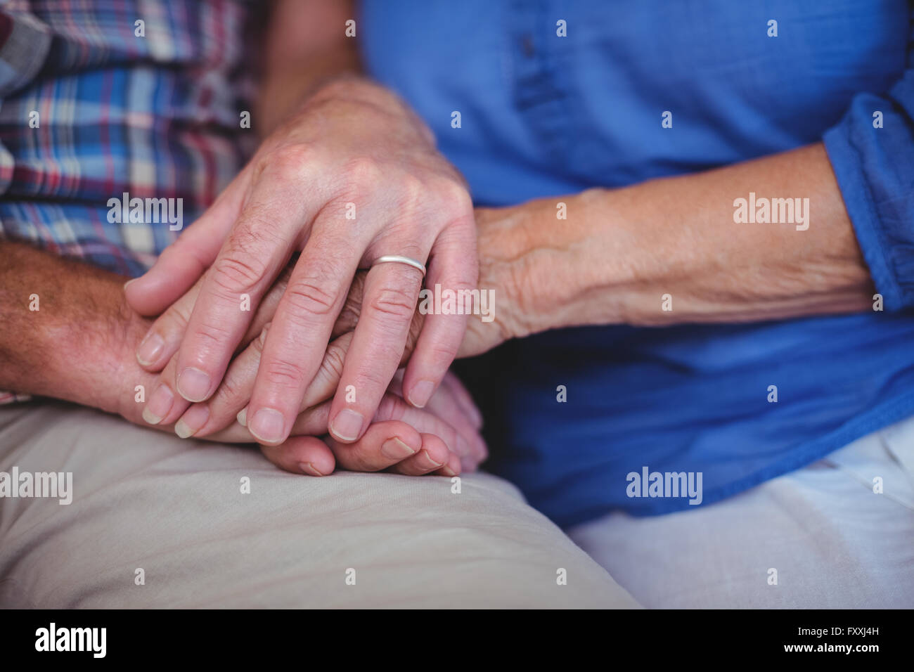 Loving couple with hands on each other Stock Photo - Alamy