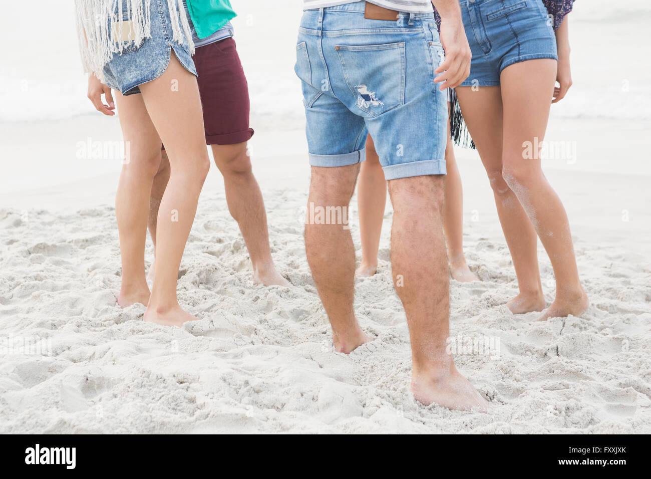 Close up of friends legs Stock Photo - Alamy