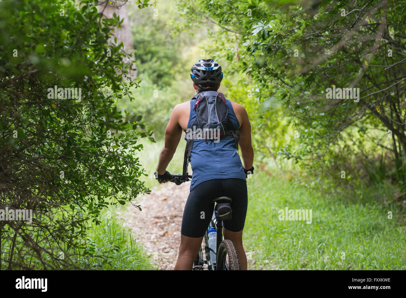 Biker biking on dirt road hi-res stock photography and images - Alamy