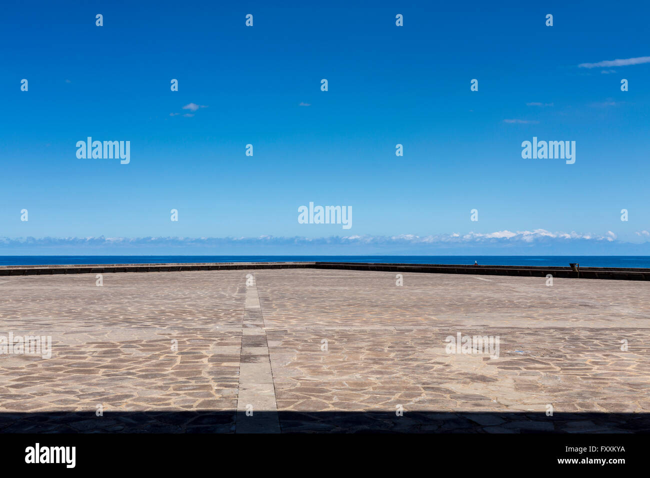 Open flat paved area with sea and sky behind Stock Photo - Alamy