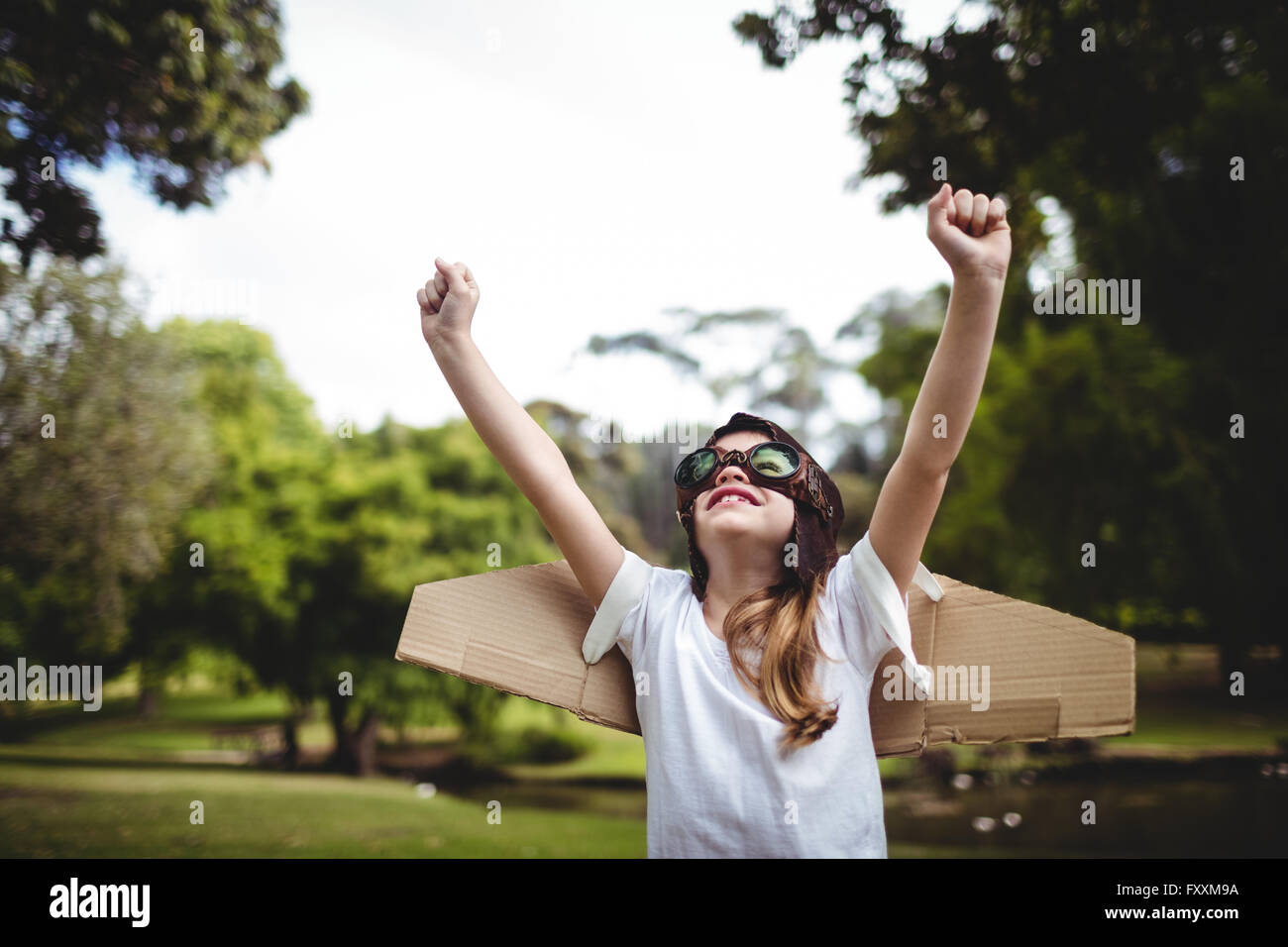 Girl raised her hands up hi-res stock photography and images - Alamy