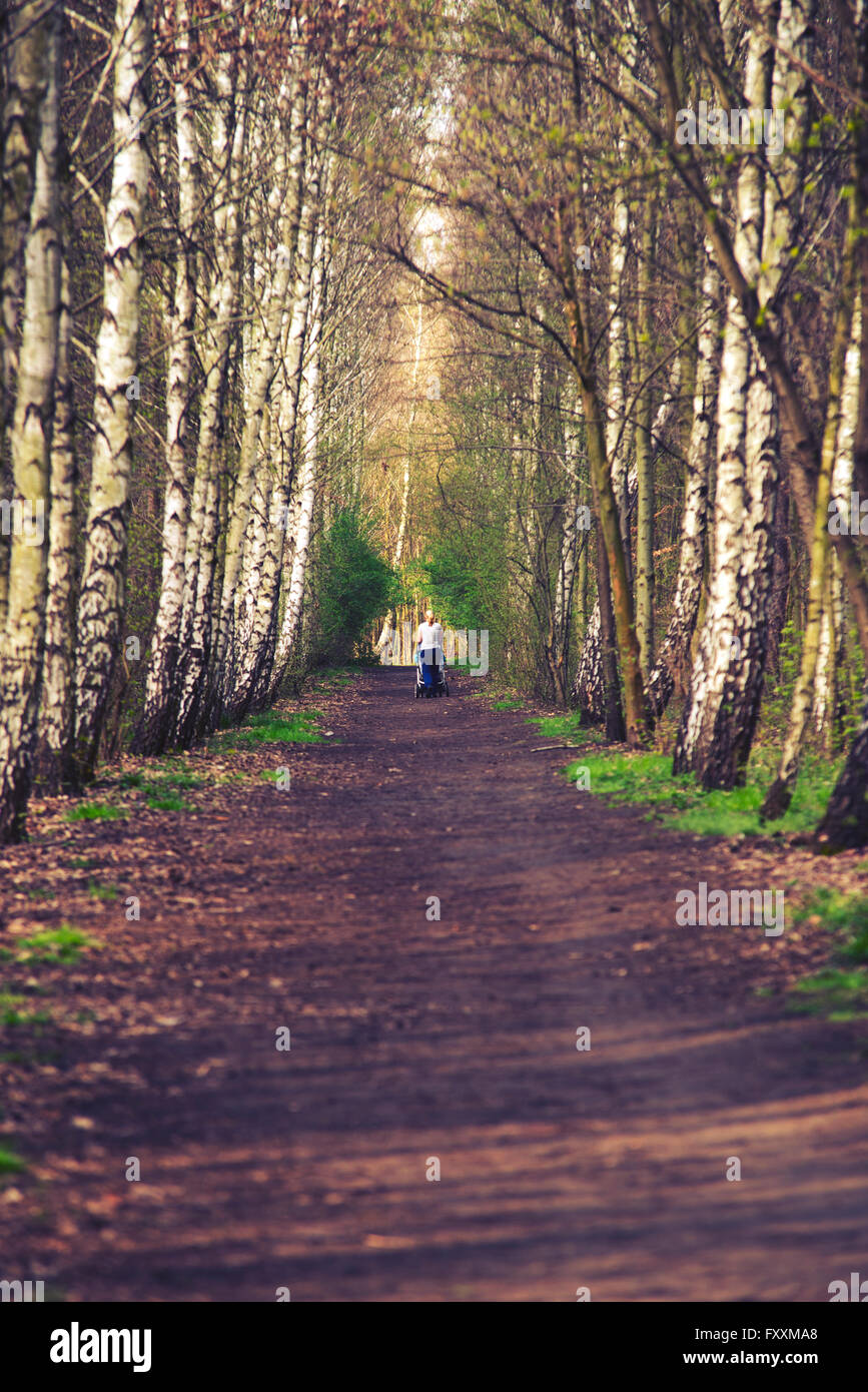 family walk through the park Stock Photo - Alamy
