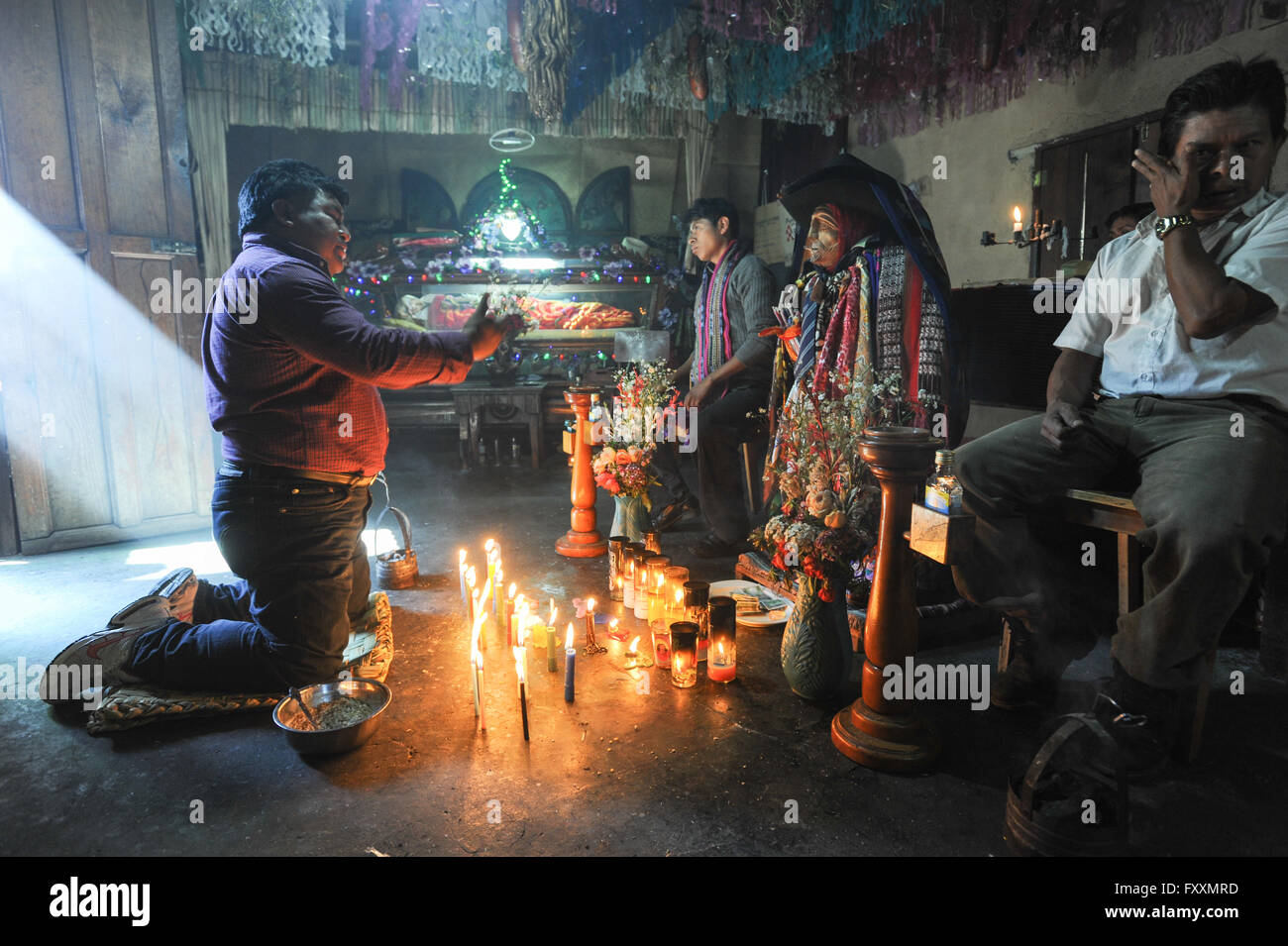Maya shaman with the divinity of Maximon at Santiago de Atitlan on ...