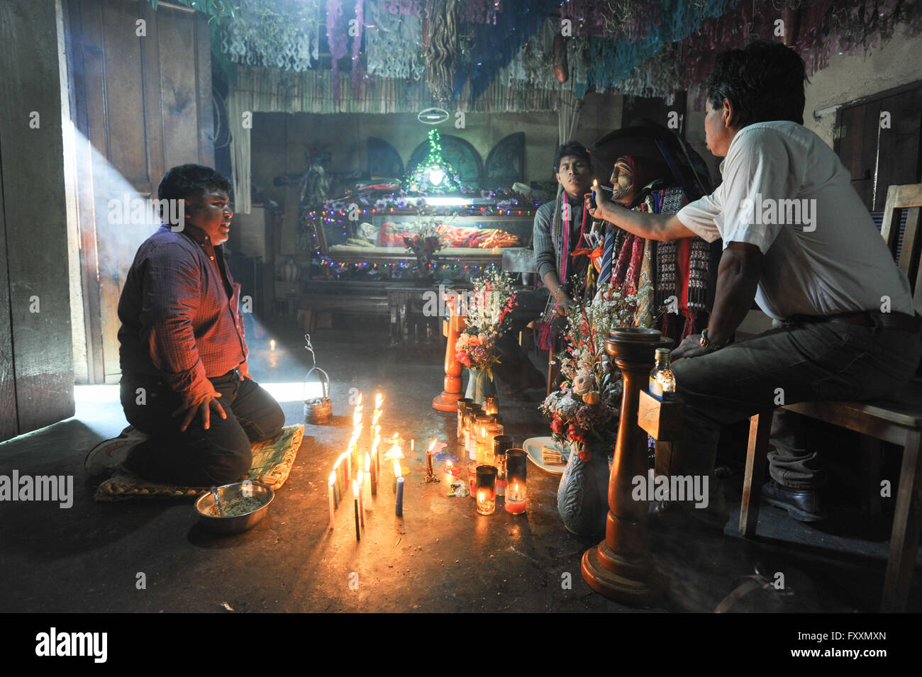 Maya shaman with the divinity of Maximon at Santiago de Atitlan on ...