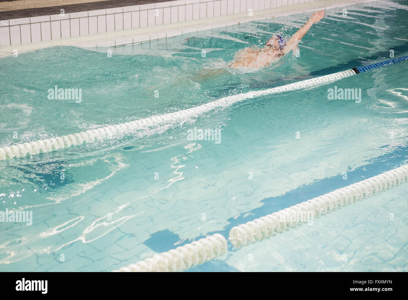Swimmer doing a backstroke in the pool Stock Photo - Alamy