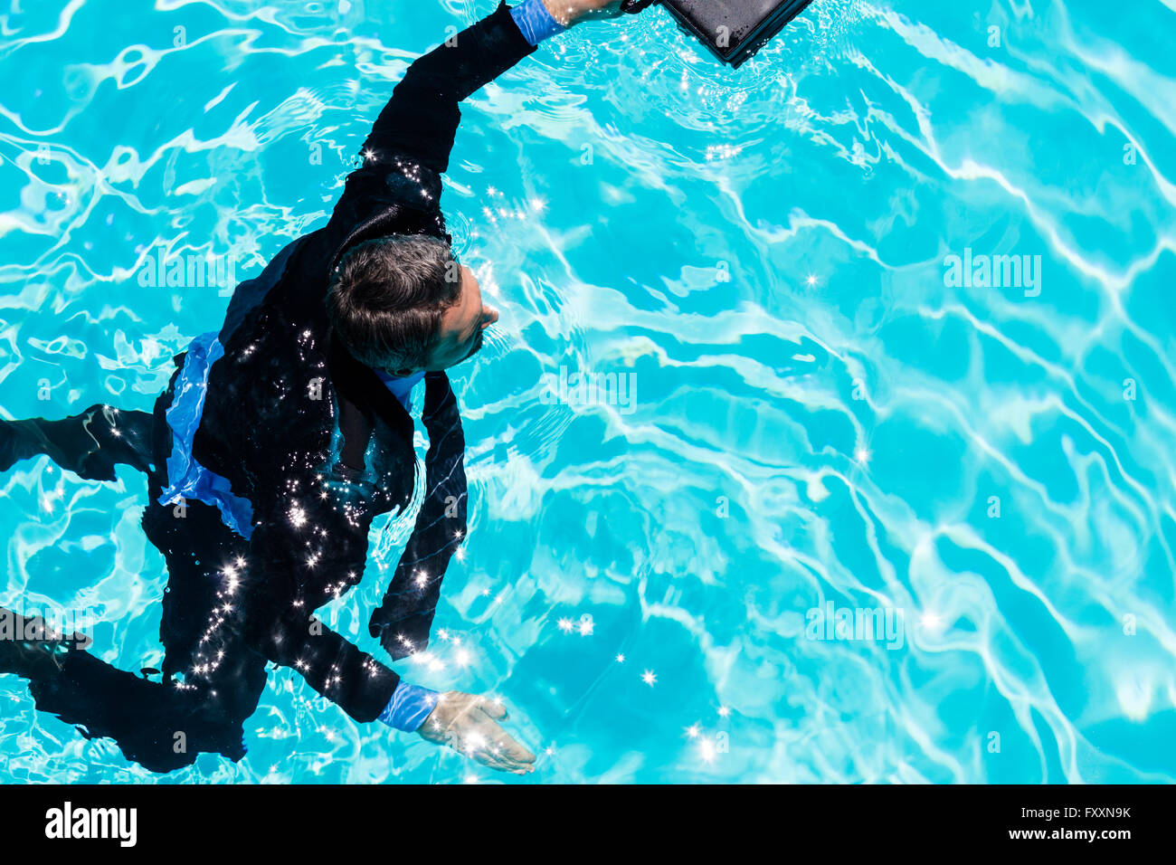 Business suit swimming pool hi-res stock photography and images - Alamy