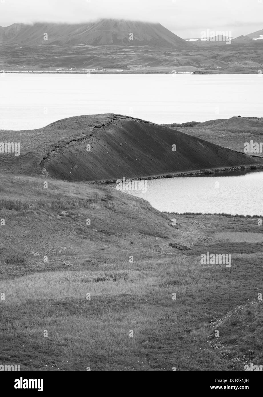 Icelandic landscape with lake and lava formations. Vertical Stock Photo ...