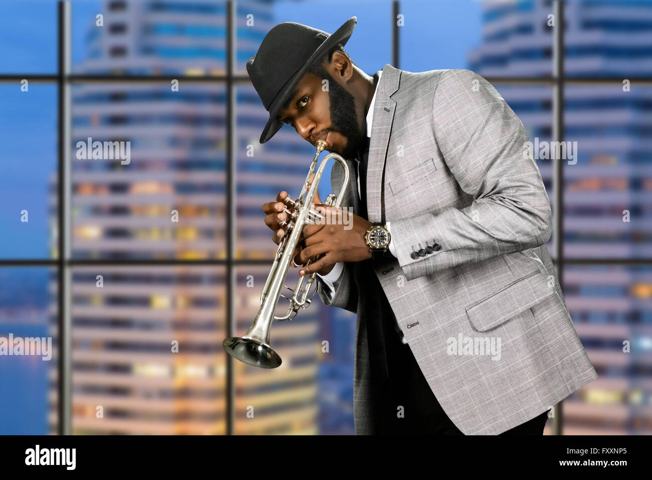 Man playing trumpet in club hi-res stock photography and images - Alamy