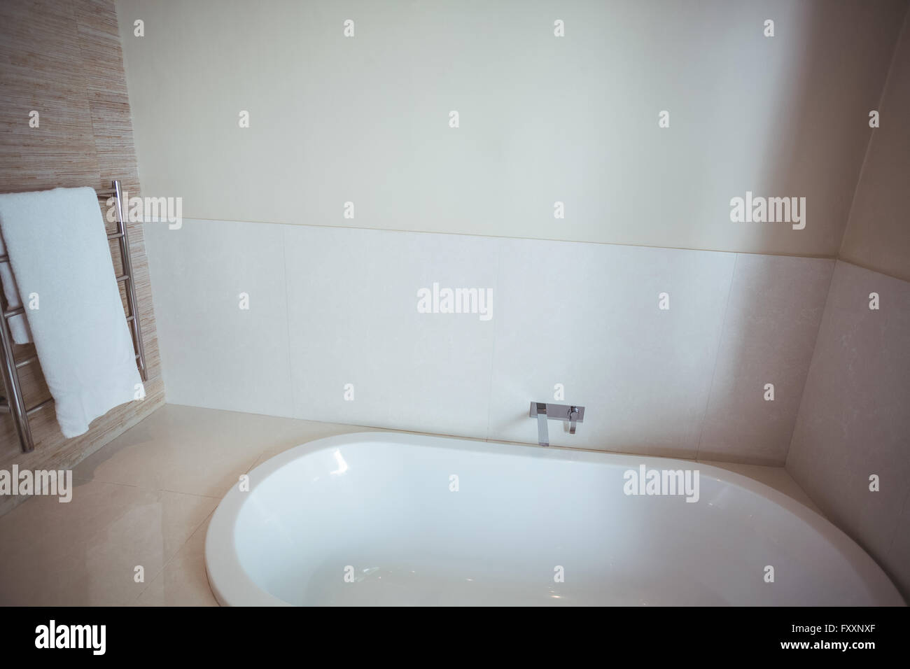 Empty bathtub in room Stock Photo - Alamy