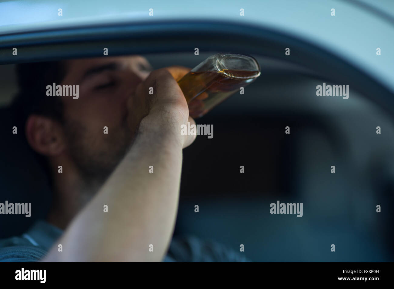 Man drinking alcohol Stock Photo - Alamy