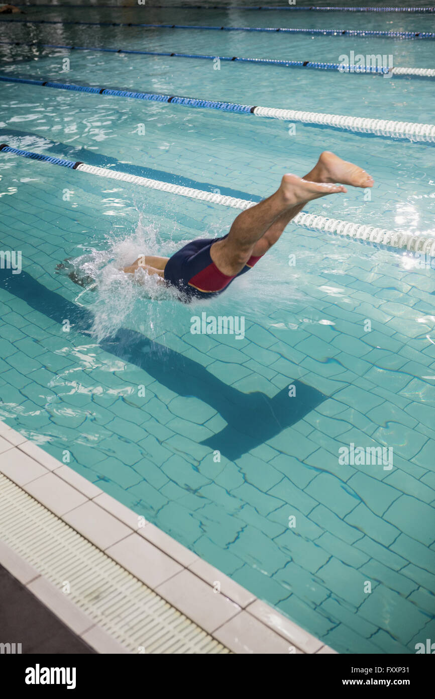 Swimmer diving into the pool Stock Photo - Alamy