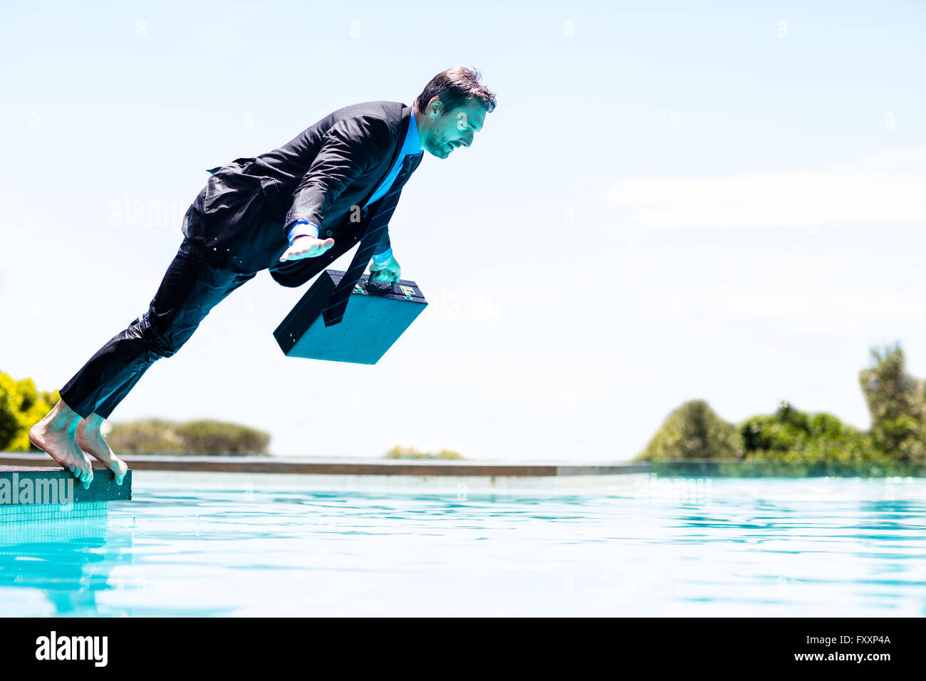 Jumping in pool hi-res stock photography and images - Alamy