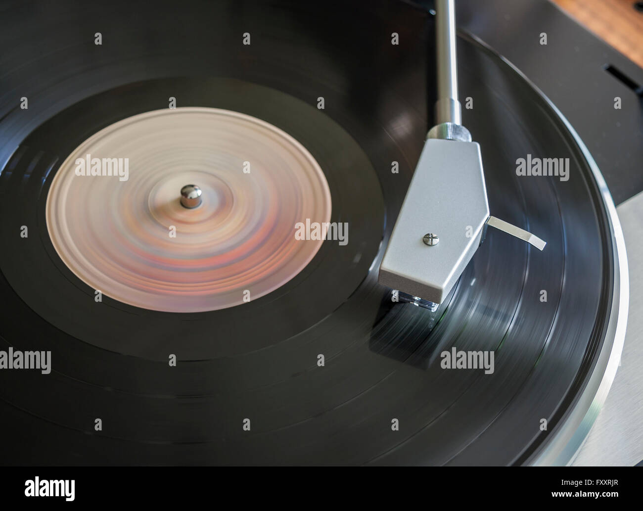 Vinyl record spinning on turntable Stock Photo - Alamy