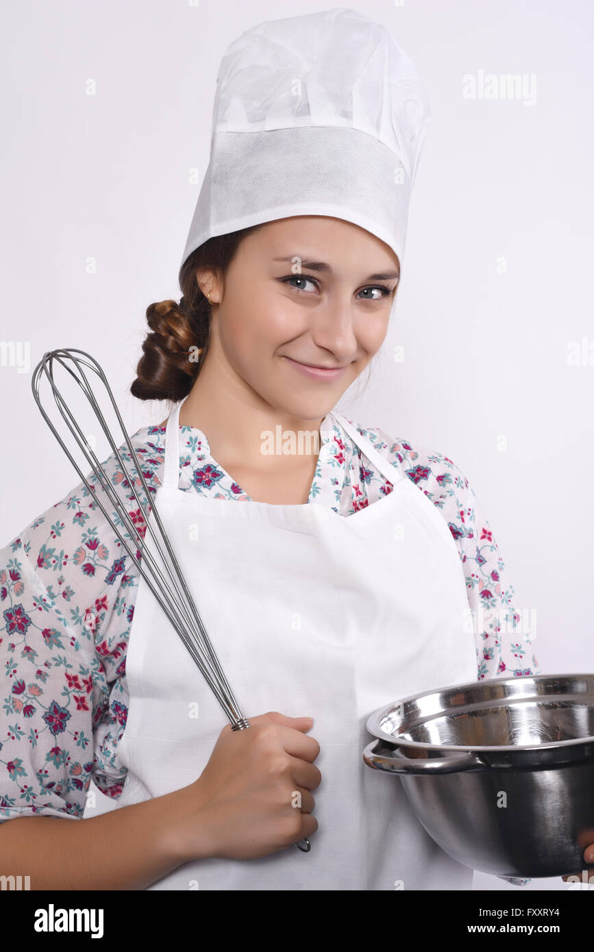 Portrait of young latin woman chef with kitchen tools. Isolated on ...