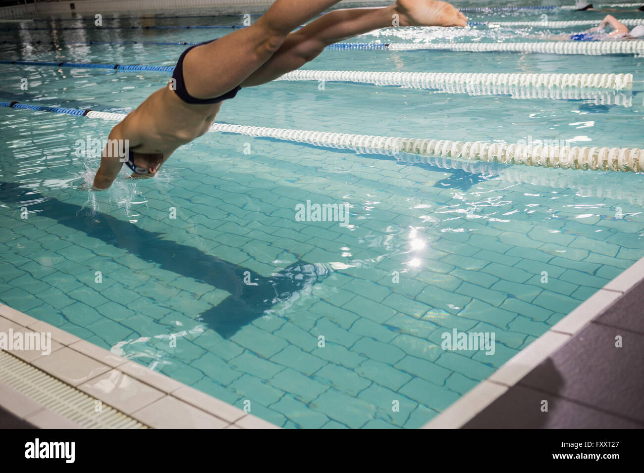 Swimmer diving into the pool Stock Photo - Alamy