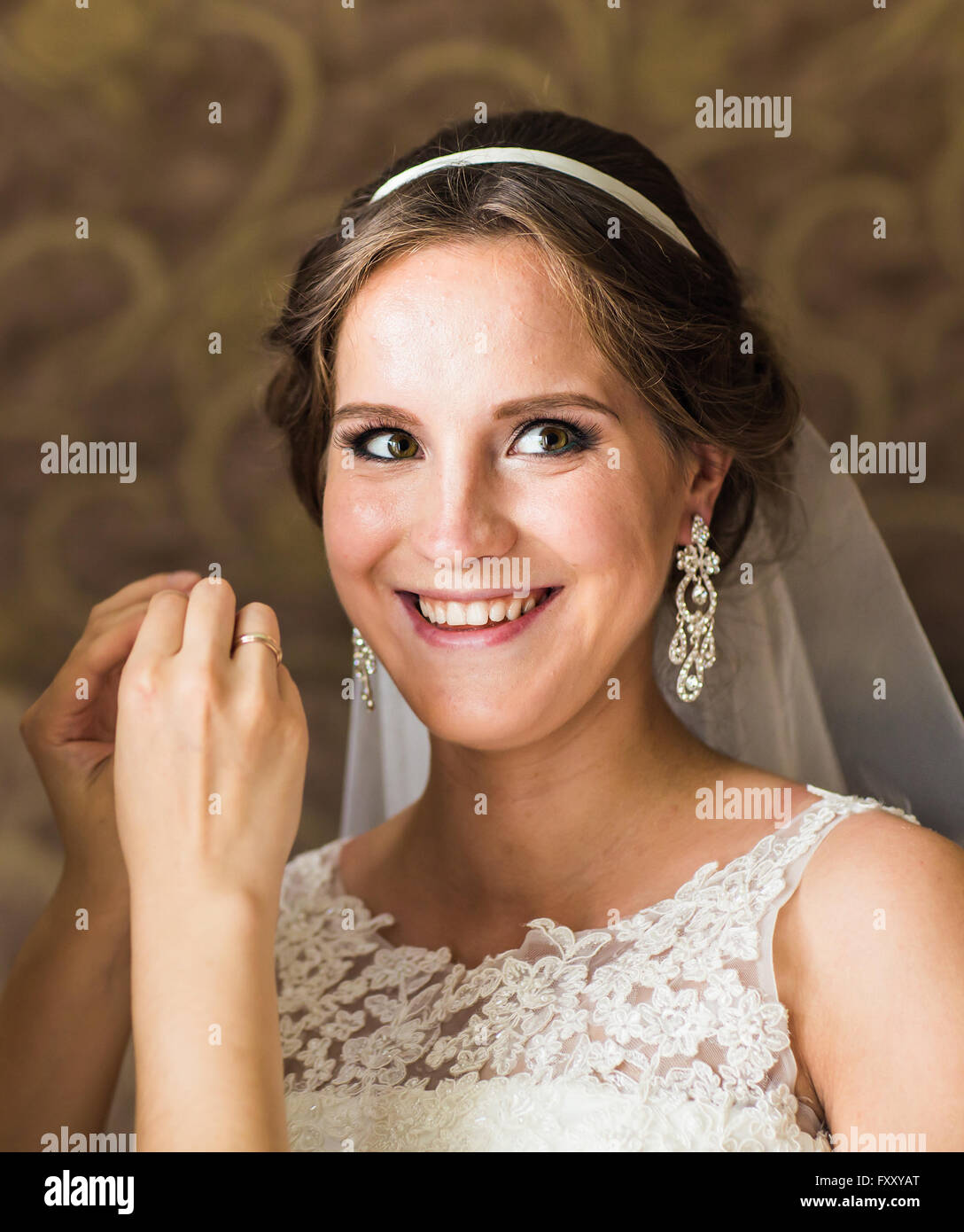 beautiful stylish bride getting ready in the room Stock Photo - Alamy