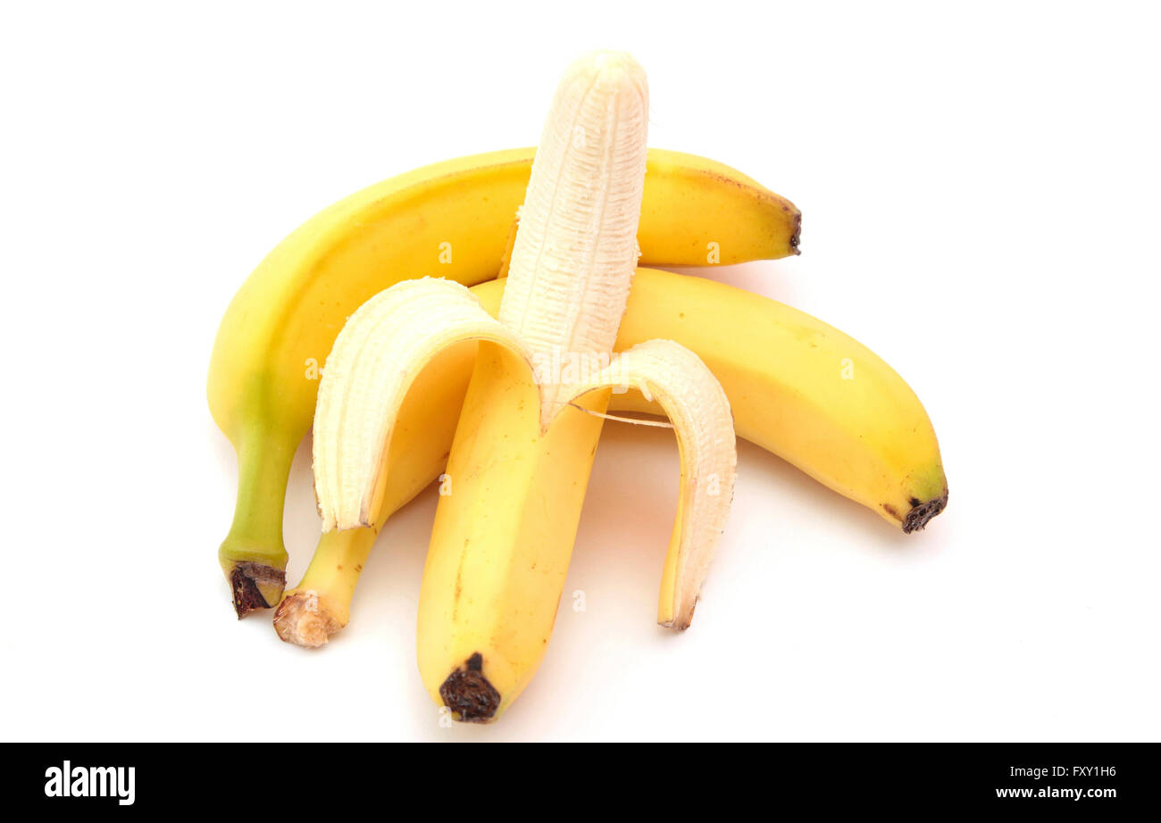 Three bananas against a white background Stock Photo - Alamy