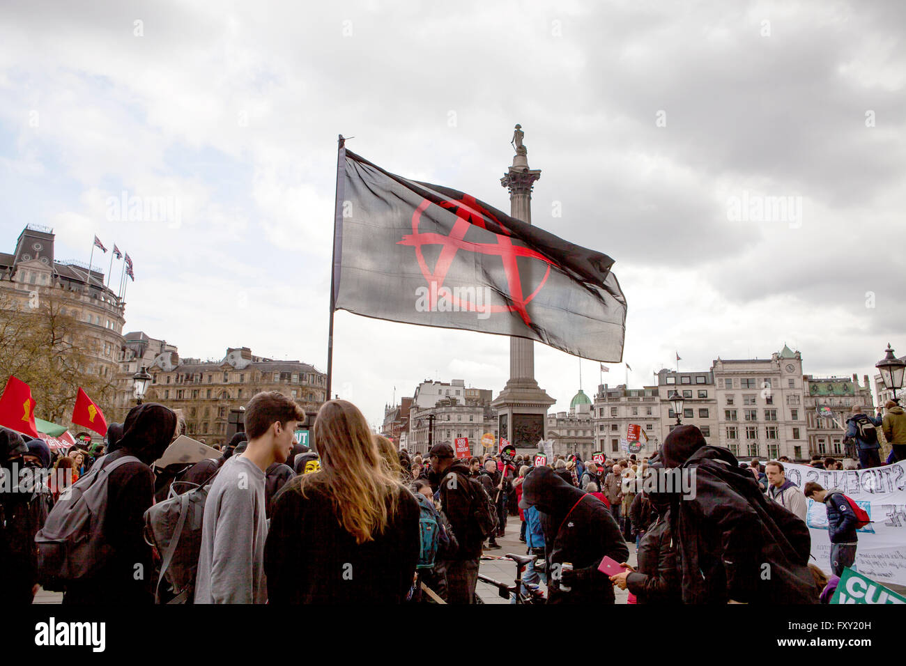 An iconic anarchist symbol stands before the British landmark of Lord ...