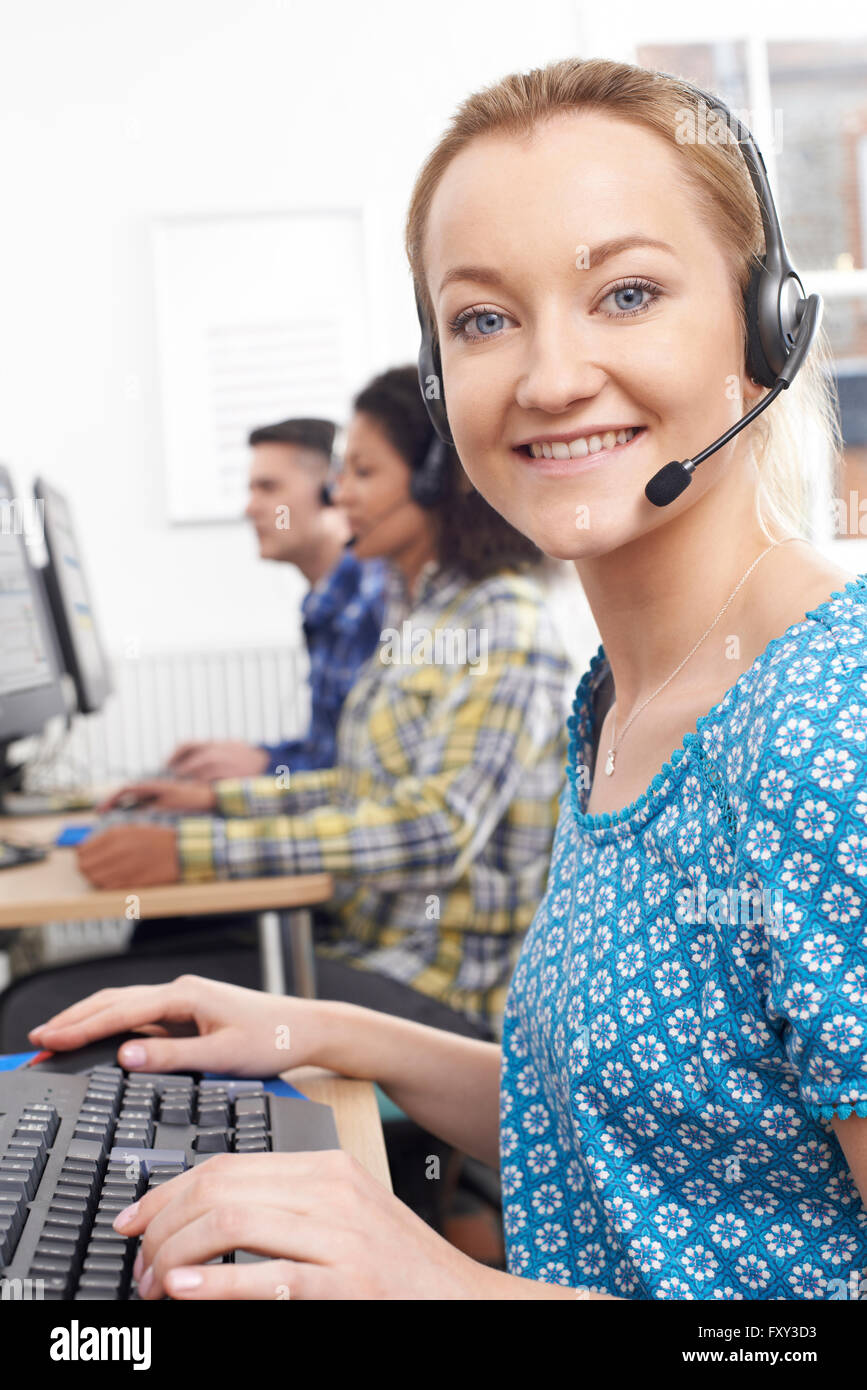 Call centre agent smiling camera hi-res stock photography and images ...
