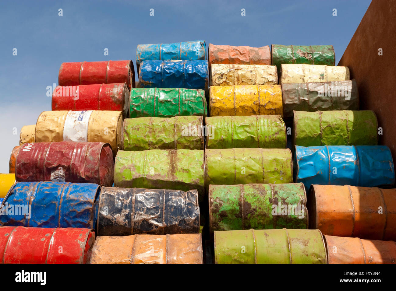 A pile of colored empty drums Stock Photo - Alamy