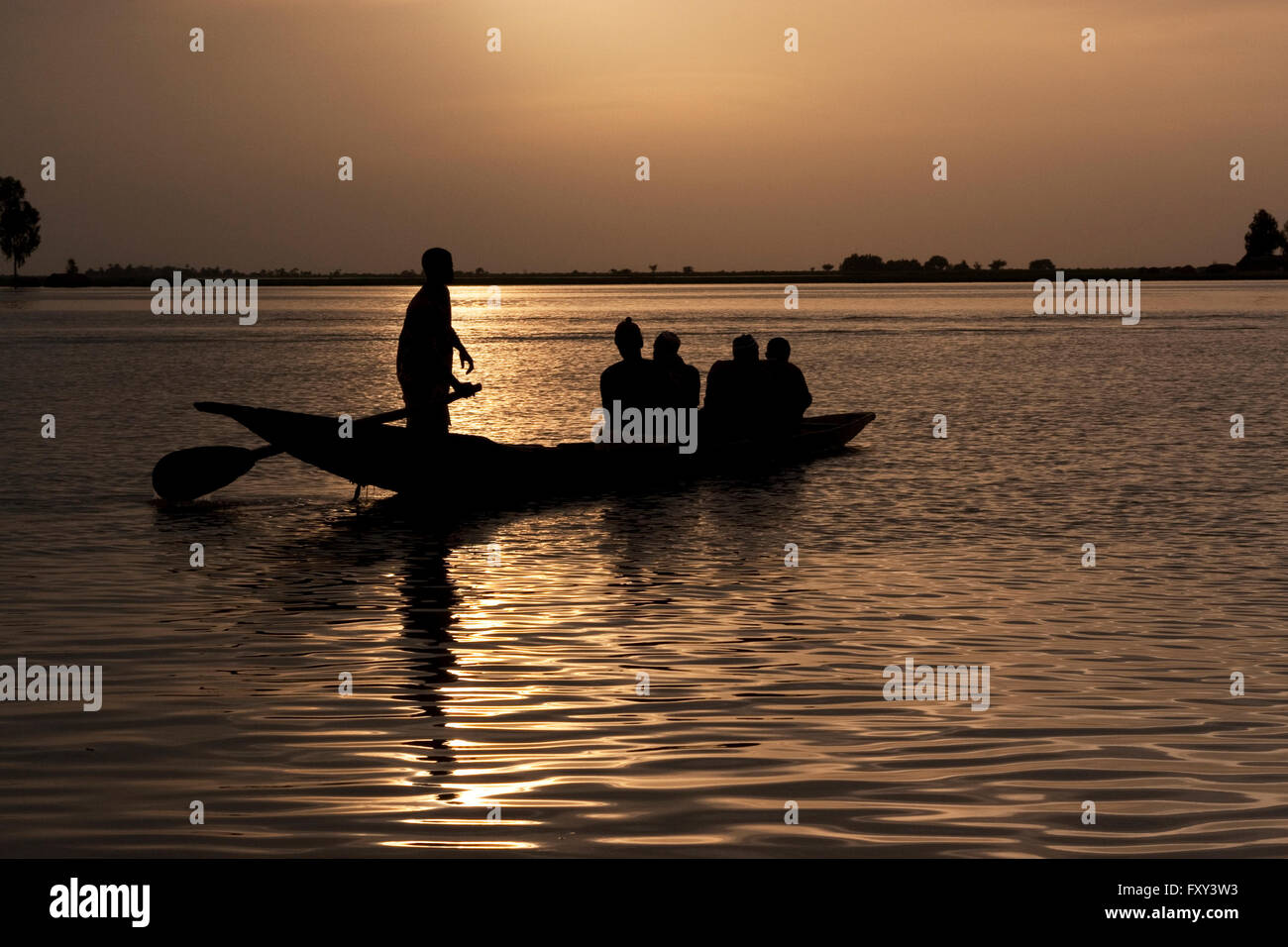 Pirogue at sunset on Niger River in Mopti, Mali Stock Photo - Alamy