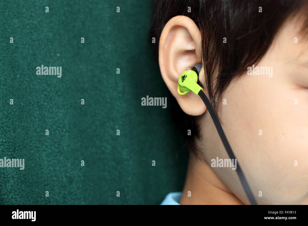 Child listening ear hi-res stock photography and images - Alamy