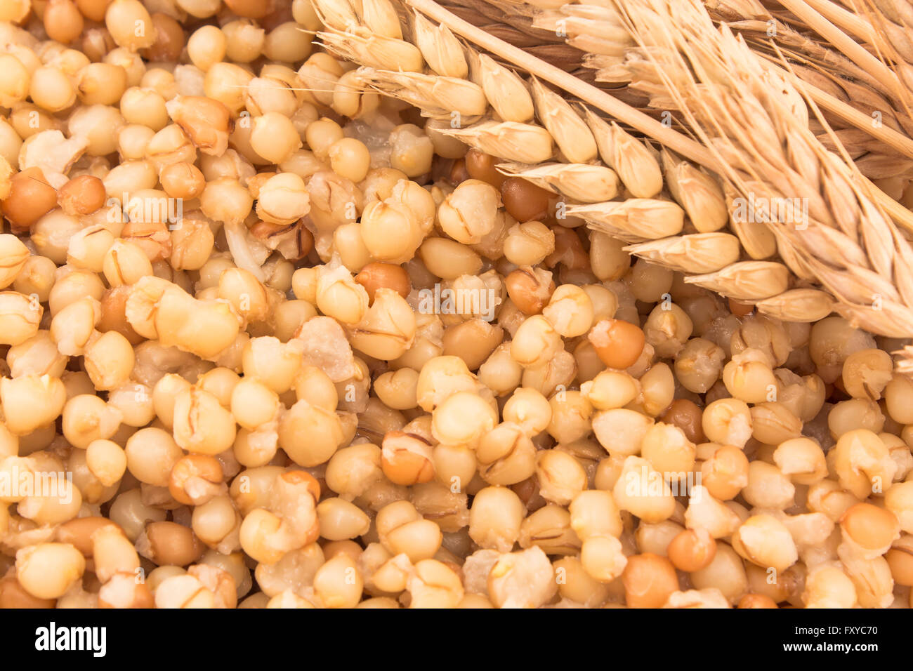 Cooked wheat and ear of wheat Stock Photo - Alamy