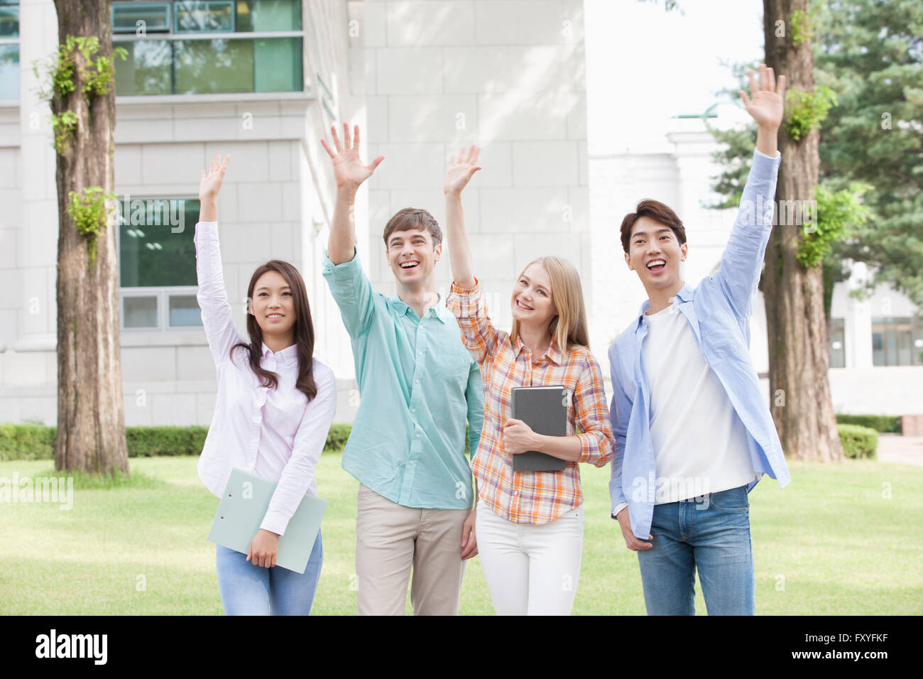 Young adult campus waving hi-res stock photography and images - Alamy
