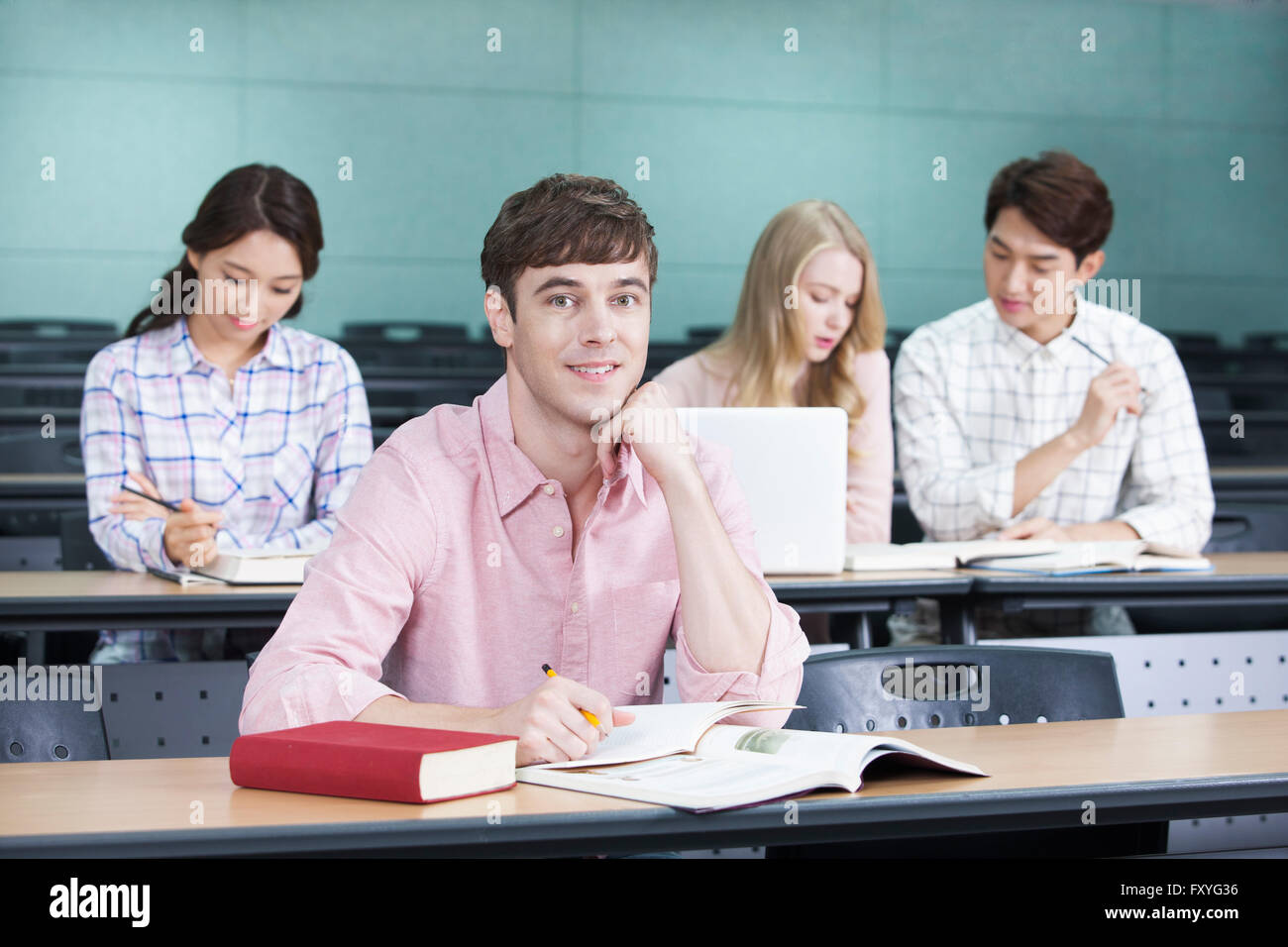 International student studying and having a class in Korean college ...