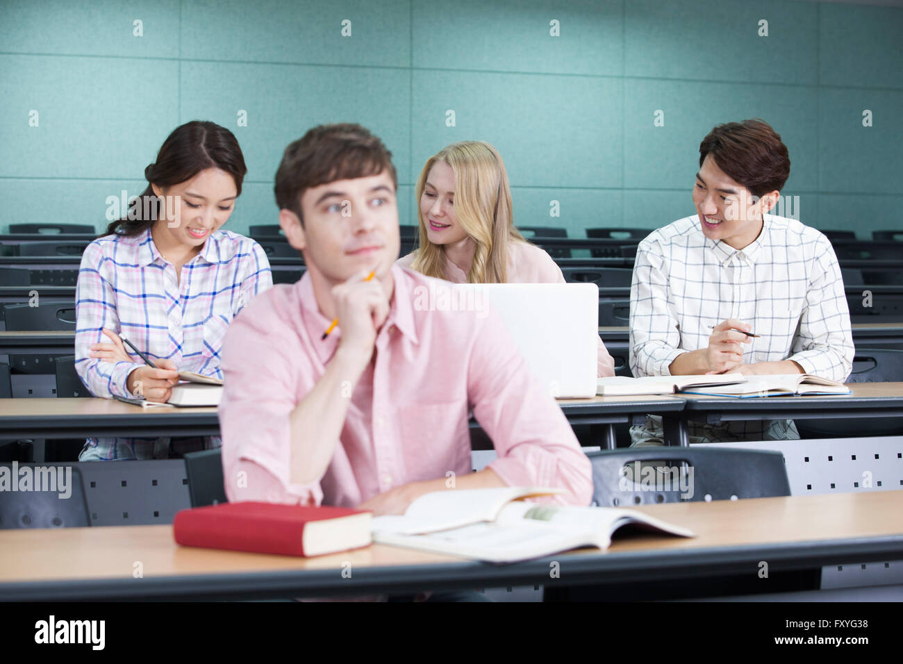 International student studying and having a class in Korean college ...