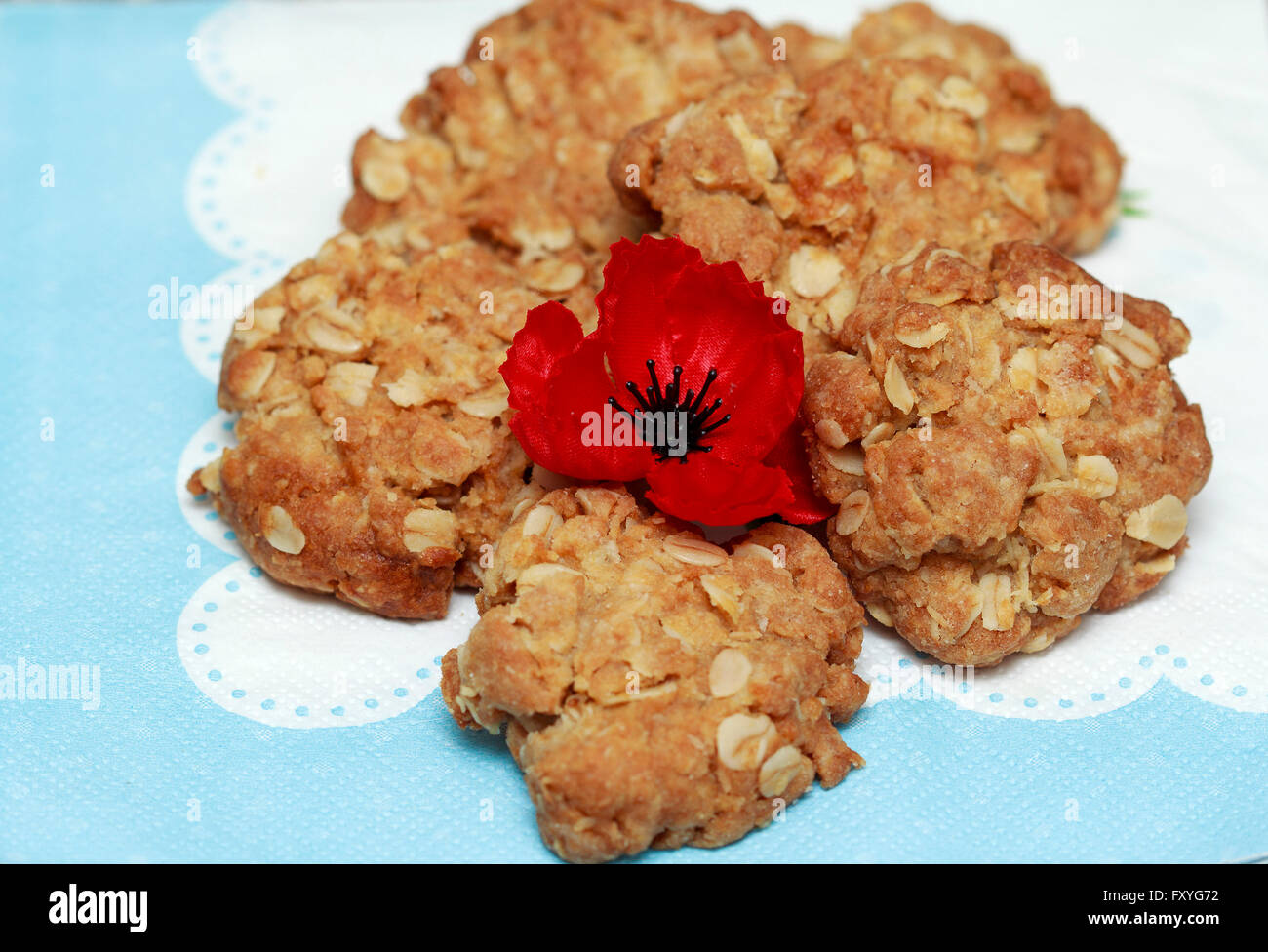 Australian homemade Anzac biscuits with red poppie Stock Photo - Alamy