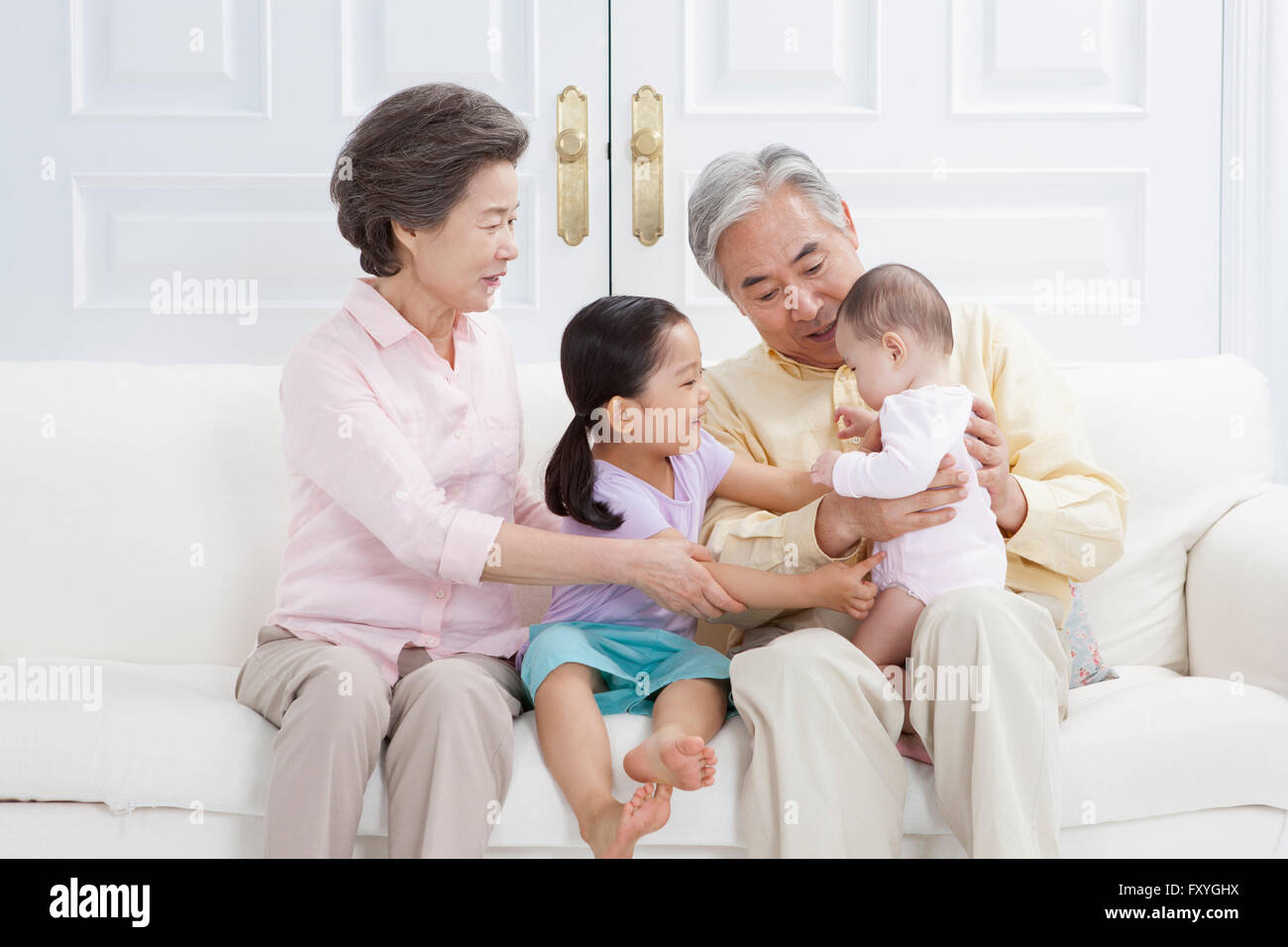Grandparents happy grandchildren hi-res stock photography and images ...